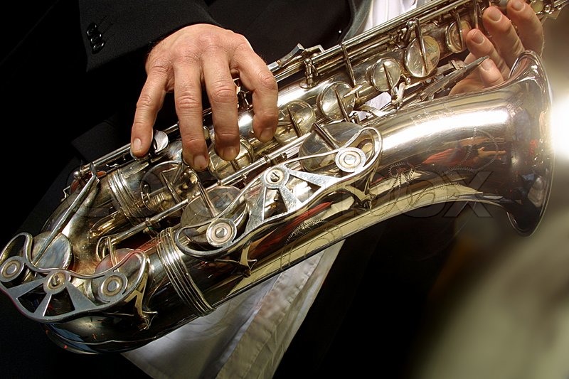 Saxophone with hands closeup | Stock Photo | Colourbox