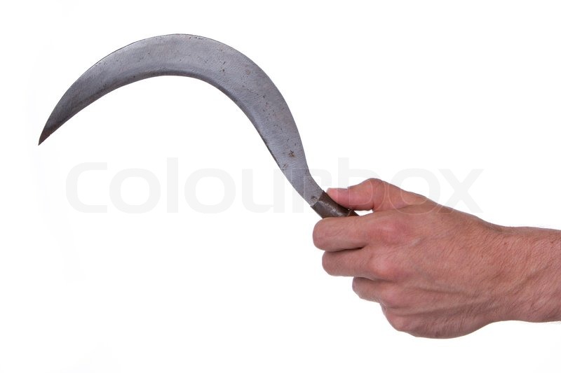 Man holding a rusted sickle | Stock image | Colourbox