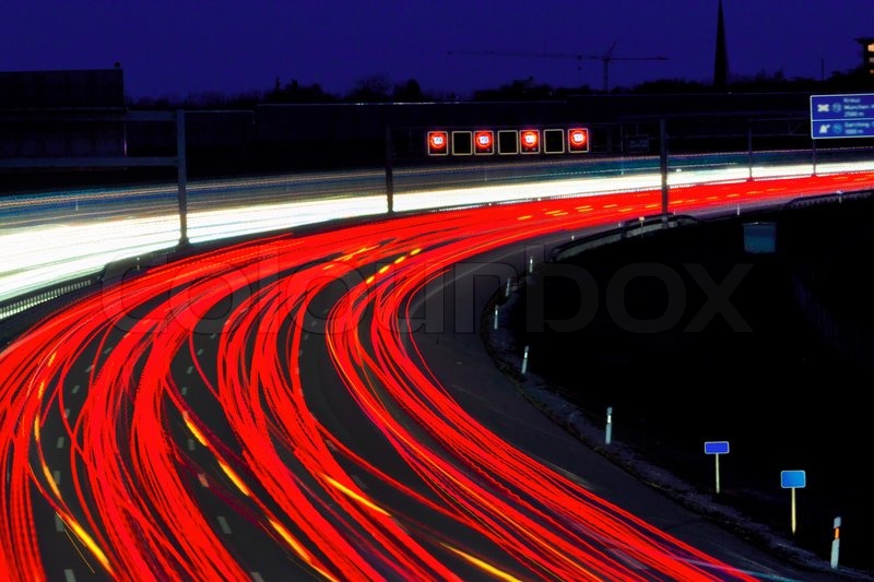 Cars on freeway at night | Stock image | Colourbox