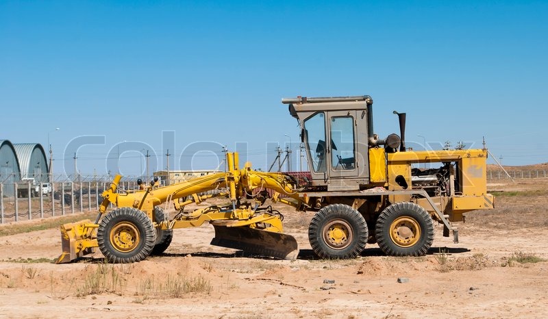The grader on building | Stock image | Colourbox