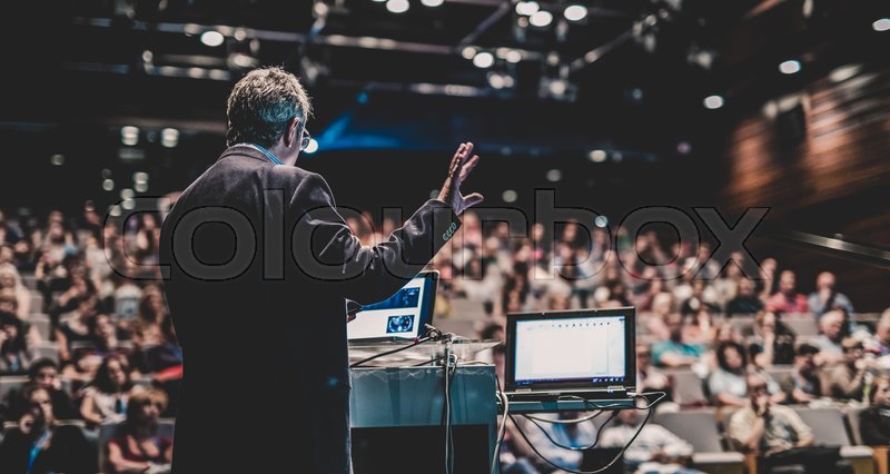 Speaker giving a talk on corporate ... | Stock image | Colourbox