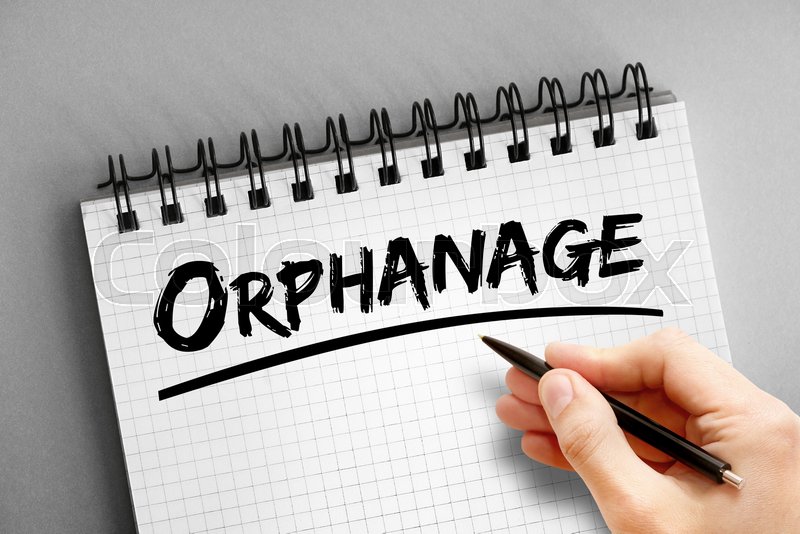 Orphanage text on notepad, concept ... | Stock image | Colourbox