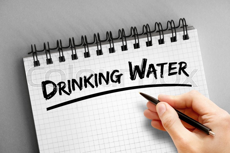 Drinking water text on notepad, concept ... | Stock image | Colourbox