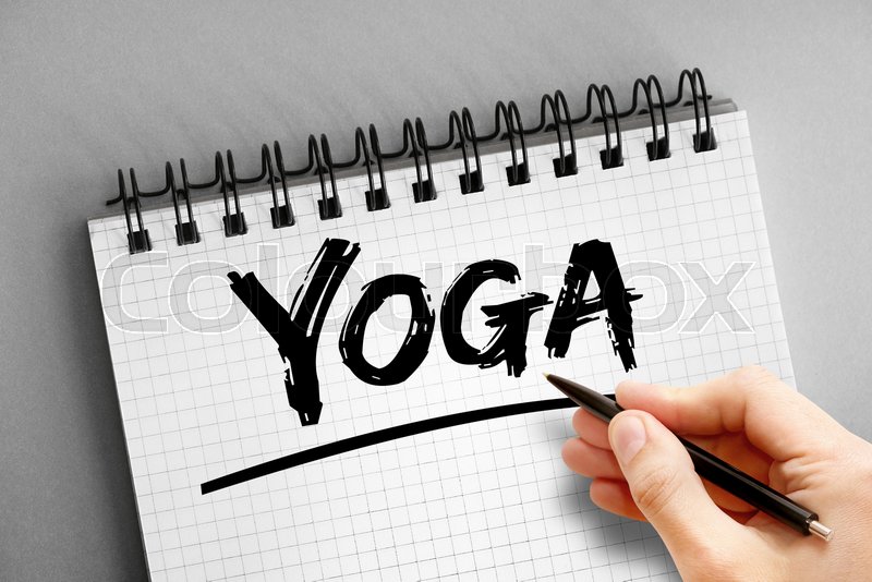 Yoga text on notepad, concept ... | Stock image | Colourbox