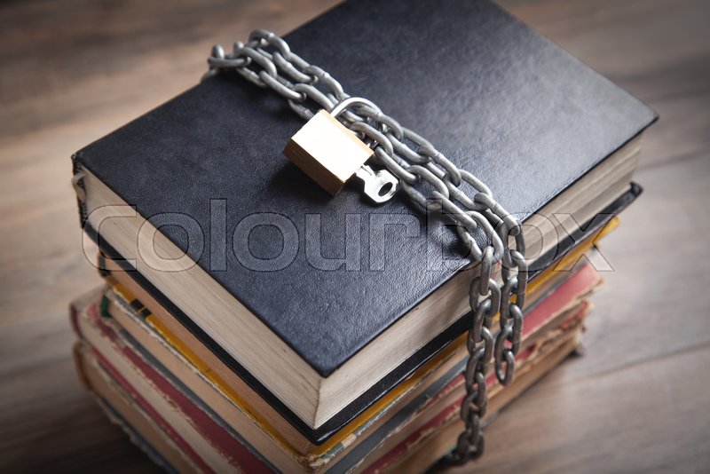 Book with chain and padlock. ... | Stock image | Colourbox