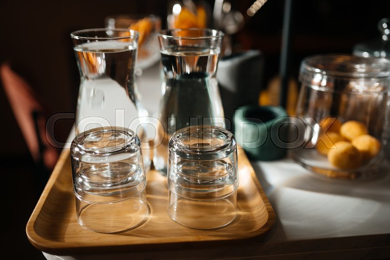 Four glass cups on the bar counter with ... | Stock image | Colourbox