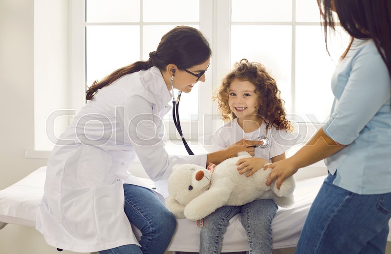 Happy cute child patient with toy ... | Stock image | Colourbox