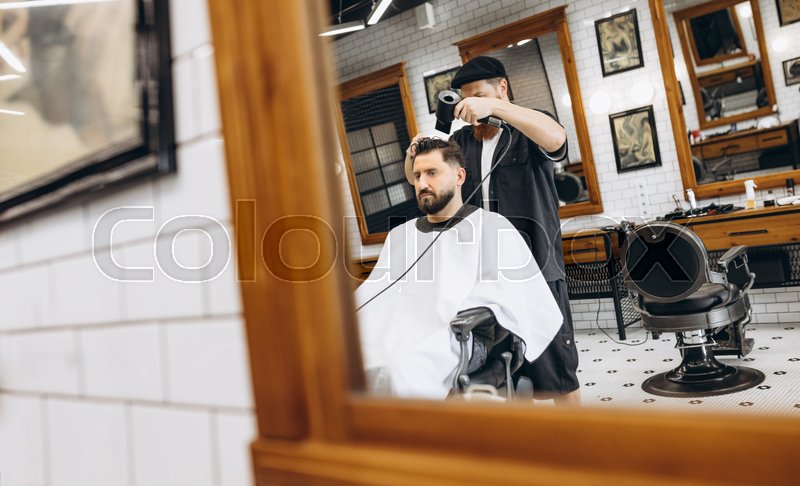 Male Hair Stylist At Work