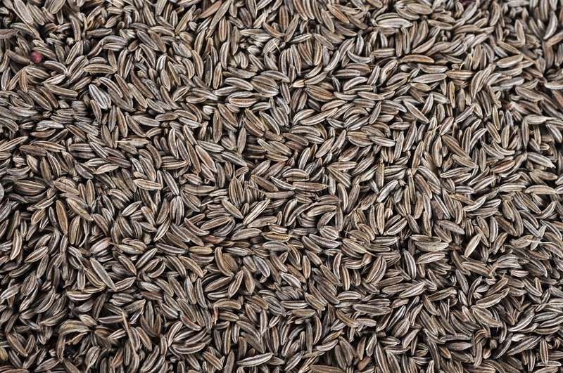 Cumin seeds texture | Stock image | Colourbox