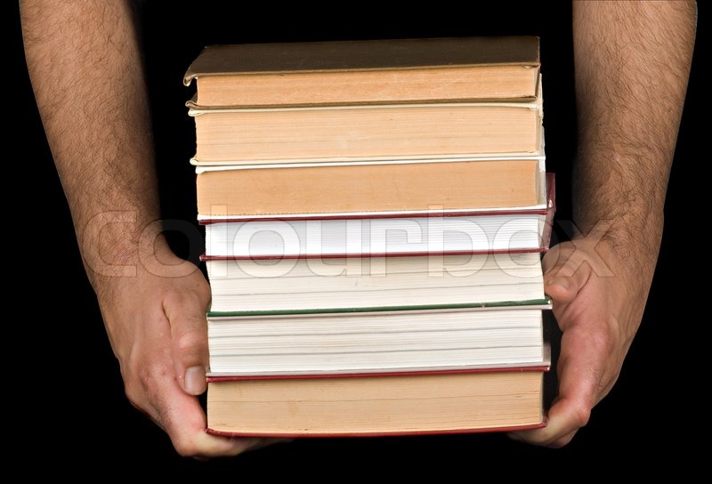 Books in hands | Stock image | Colourbox
