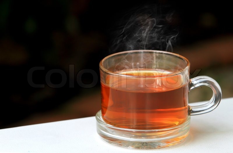 A glass bowl with hot Chinese tea | Stock Photo | Colourbox