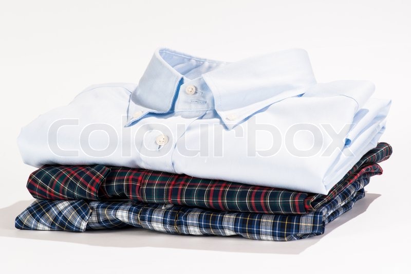 Stack of folded shirts | Stock image | Colourbox
