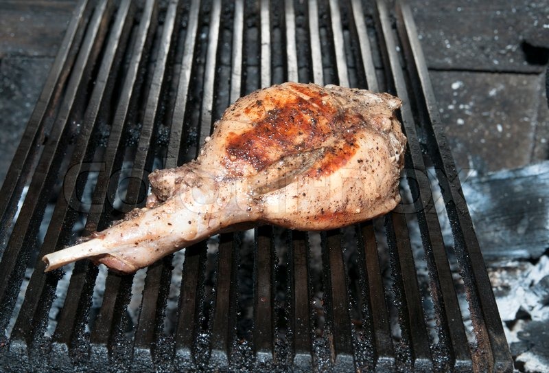 Cooking rabbit meat on the grill | Stock image | Colourbox