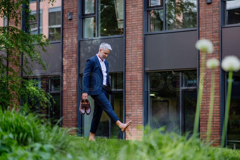 Businessman Walking To Work