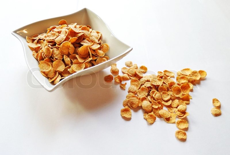Corn flakes bowl isolated on white | Stock image | Colourbox