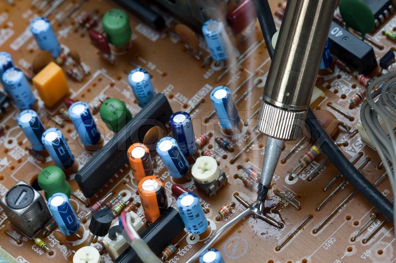 Soldering iron and verification testing ... | Stock image | Colourbox