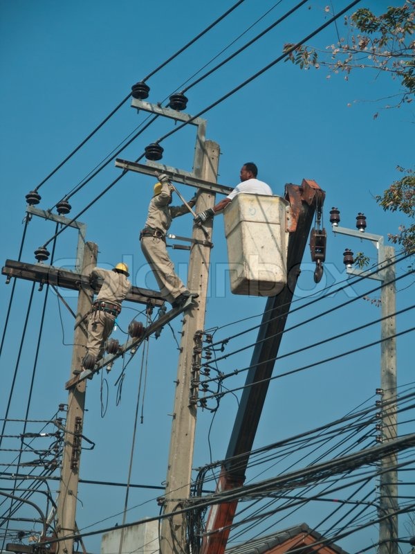 Electrician working on power line | Stock image | Colourbox
