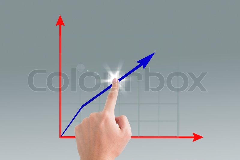 Business man pointing a growing graph ... | Stock image | Colourbox