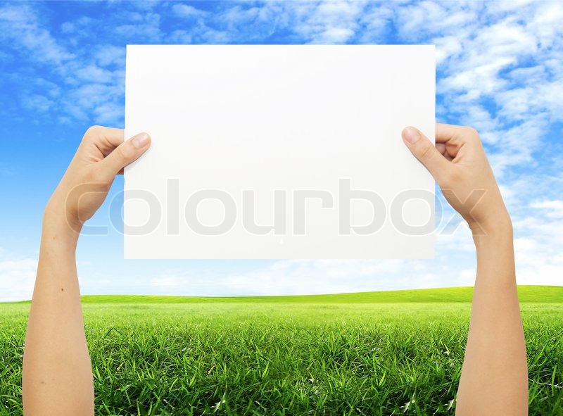 Hand holding a paper isolated on ... | Stock image | Colourbox