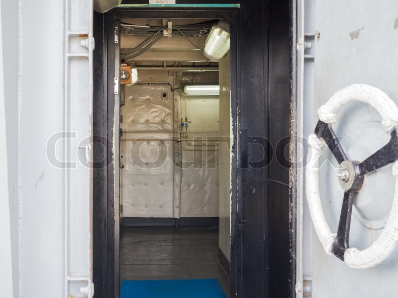 Handle of white ship door open inside | Stock image | Colourbox