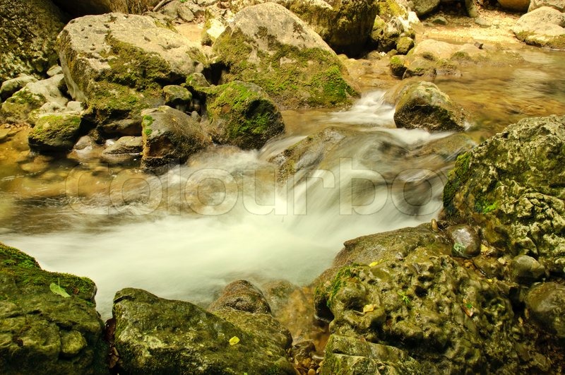 Fast flowing water | Stock image | Colourbox