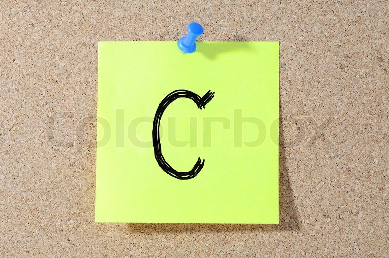 C grade written on a test paper | Stock image | Colourbox