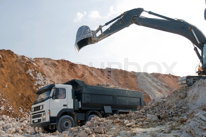 Loading a large lorry building material | Stock image | Colourbox