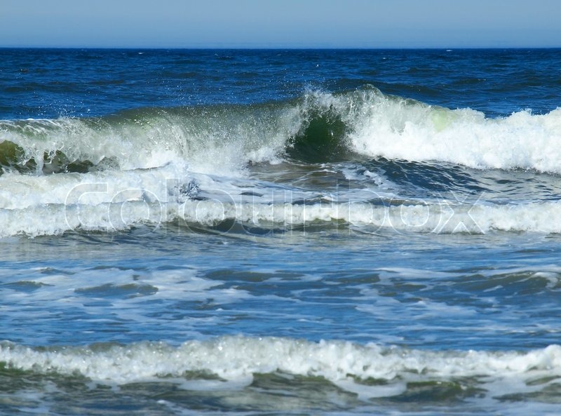 An Ocean Wave Breaking on Shore on a ... | Stock image | Colourbox