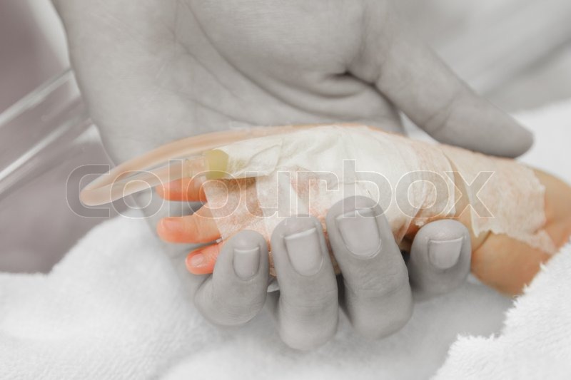 Hand of sick baby with I V injection on ... | Stock image | Colourbox