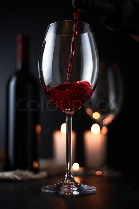 Wine Pouring Black Background