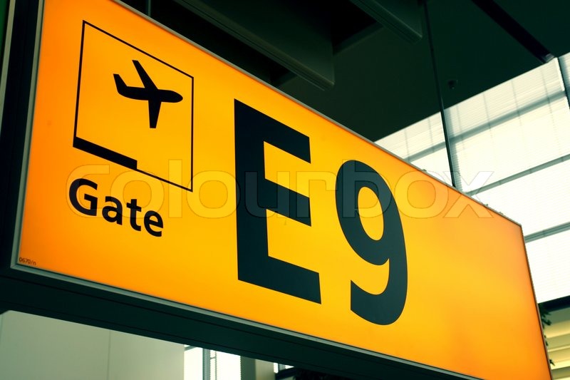 Directional sign in an airport | Stock image | Colourbox