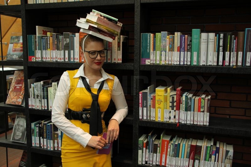 The municipal library, the lady with ... | Stock image | Colourbox