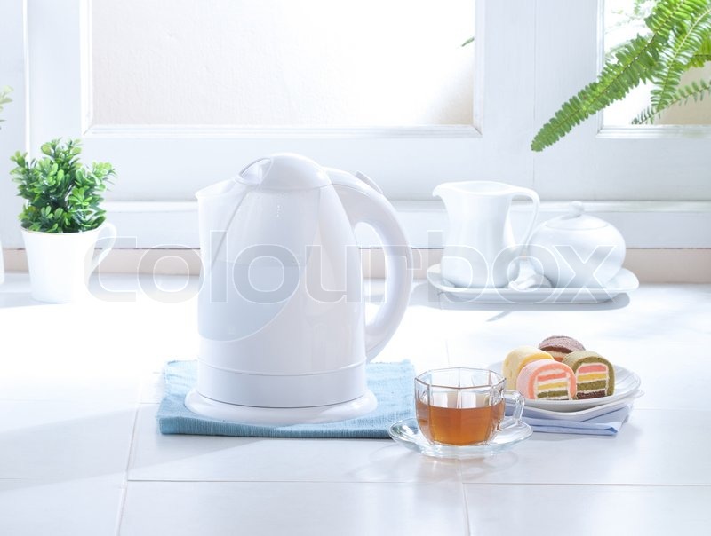 Cute design of the electric kettle for ... | Stock image | Colourbox