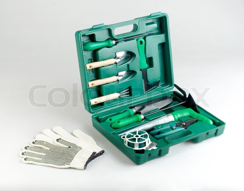 Gardening tools kit in green case | Stock Photo | Colourbox