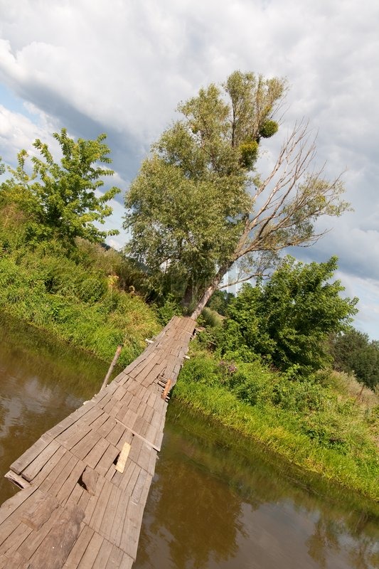 Wooden bridge over river | Stock image | Colourbox