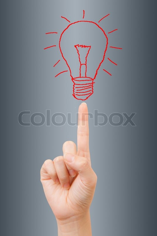 Finger pointing to a light bulb, on ... | Stock image | Colourbox