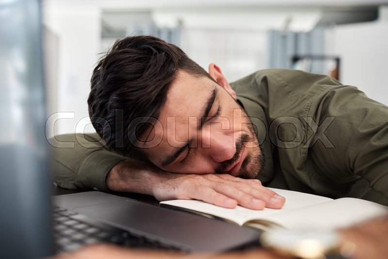 Person Sleeping At Desk