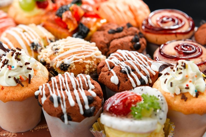 Colorful muffins in variety flavor | Stock image | Colourbox