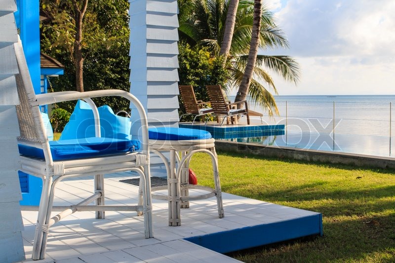 Swimming pool overlooking the sea and ... | Stock Photo | Colourbox