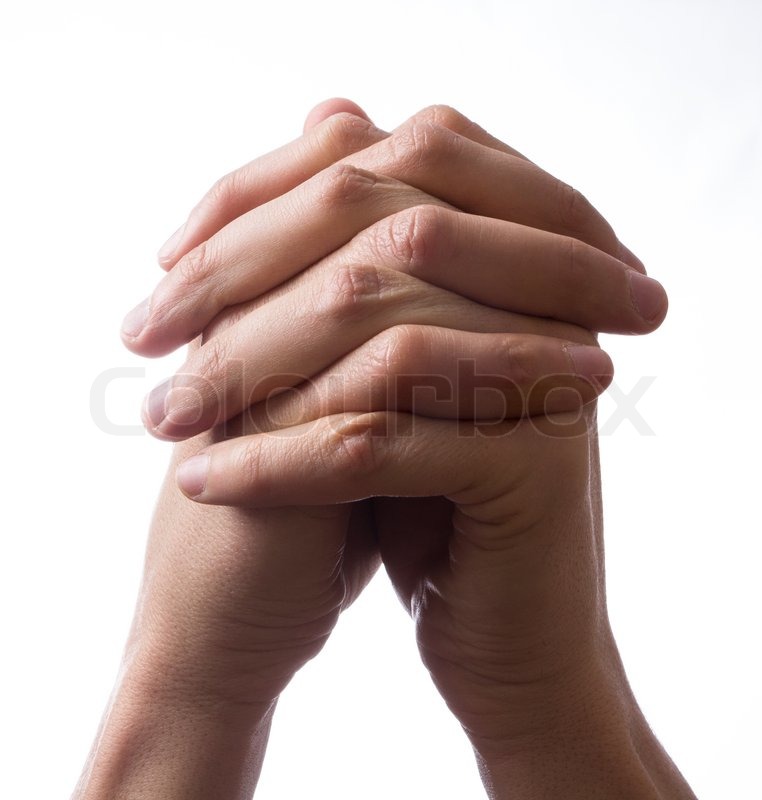 Hands clasped together for a prayer | Stock Photo | Colourbox