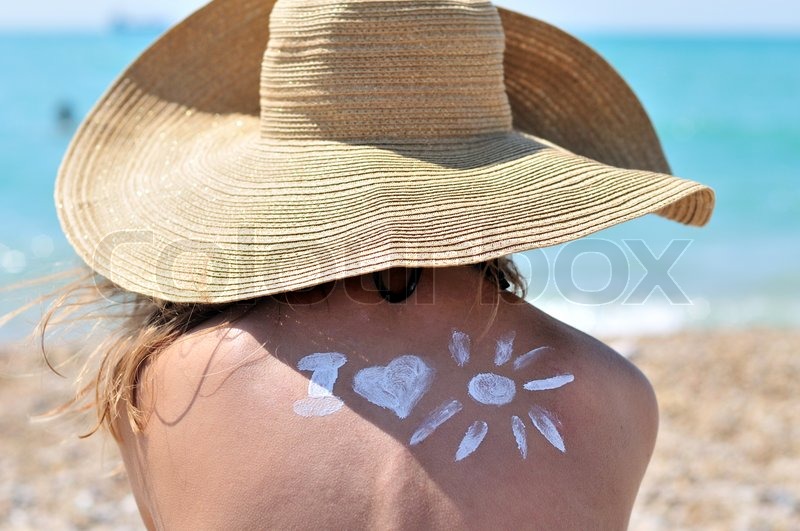 Sun Protection, girl using sunscreen ... | Stock image | Colourbox