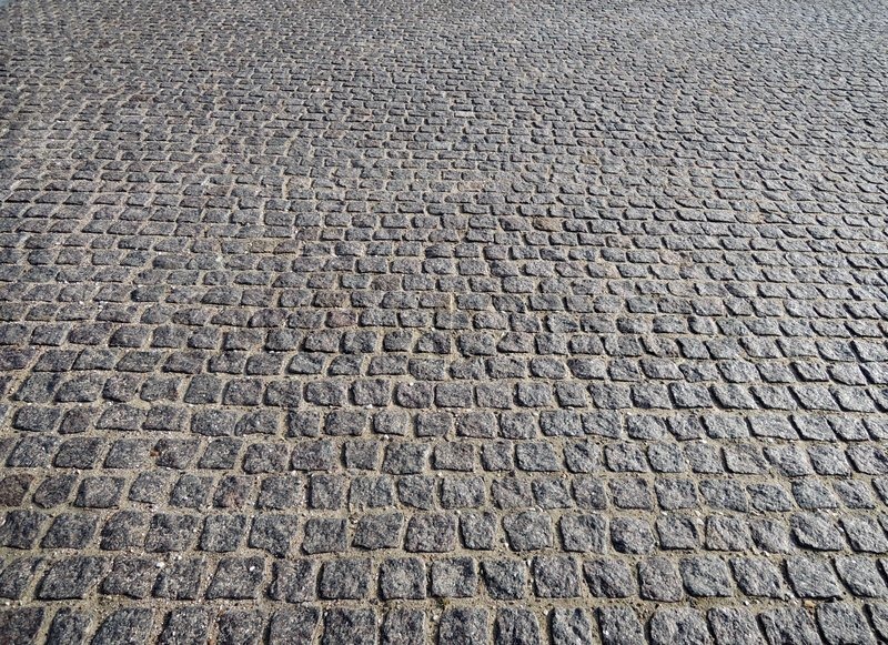 Closeup view on a cobblestone road - ... | Stock image | Colourbox