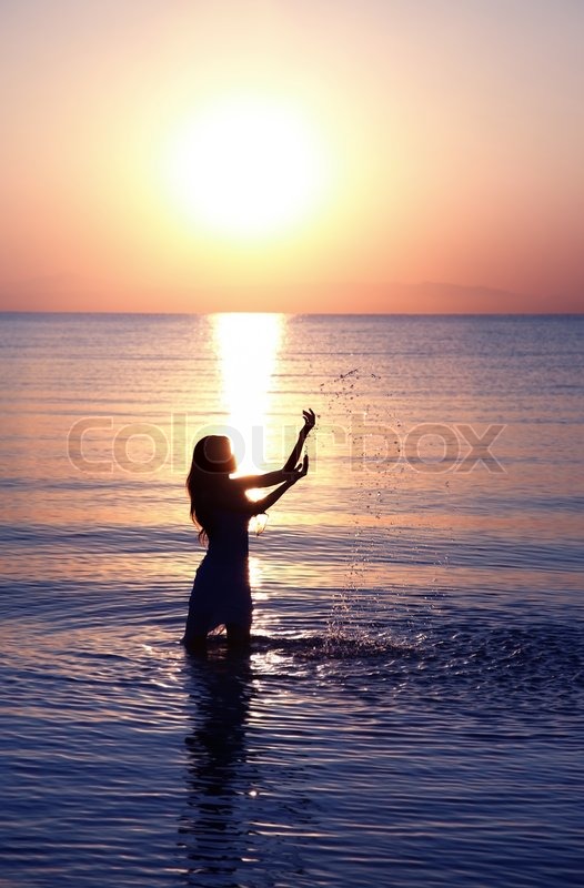 Woman at sunset | Stock Photo | Colourbox