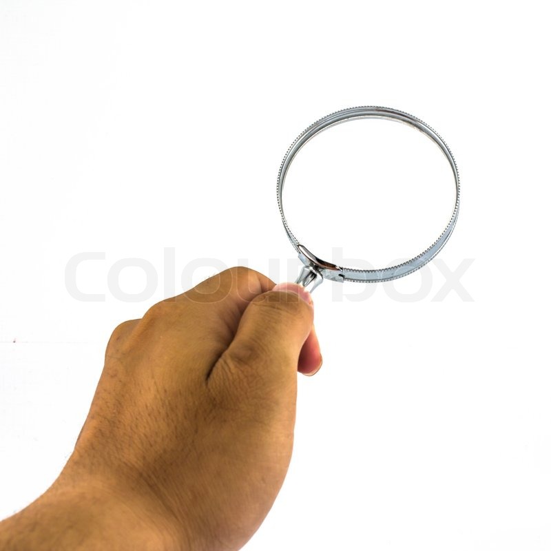 Hand hält Lupe | Stock Bild | Colourbox