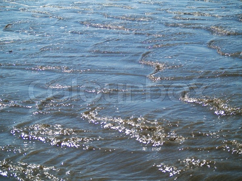 Ocean Waves and Ripples Gently Rolling ... | Stock image | Colourbox
