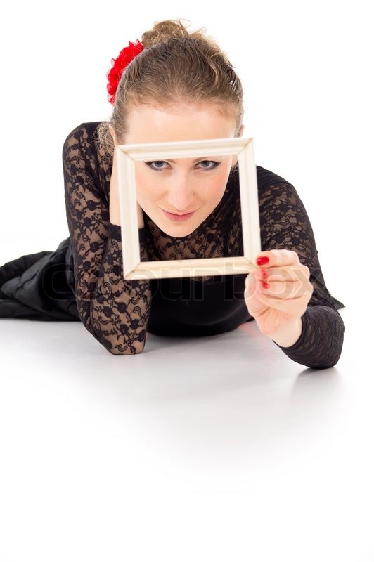 Girl holds a frame | Stock image | Colourbox
