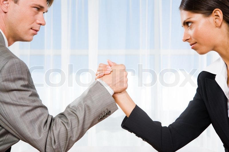 Portrait of business competitors doing ... | Stock image | Colourbox