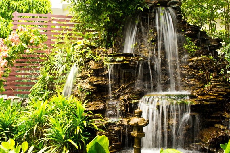 Beautiful waterfall in the garden | Stock Photo | Colourbox