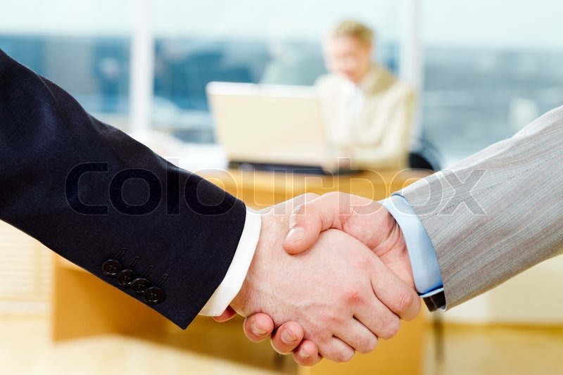 Close-up of corporate deal on the ... | Stock image | Colourbox