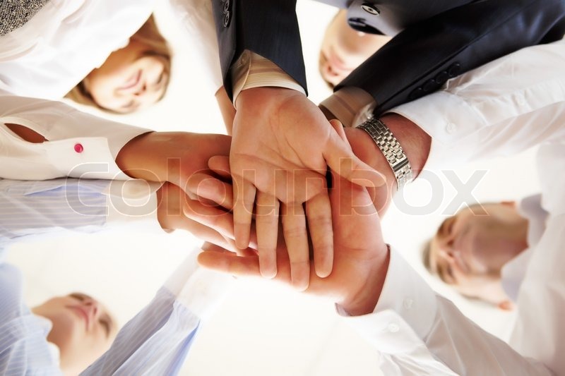 Photo of hands on top of each other ... | Stock image | Colourbox